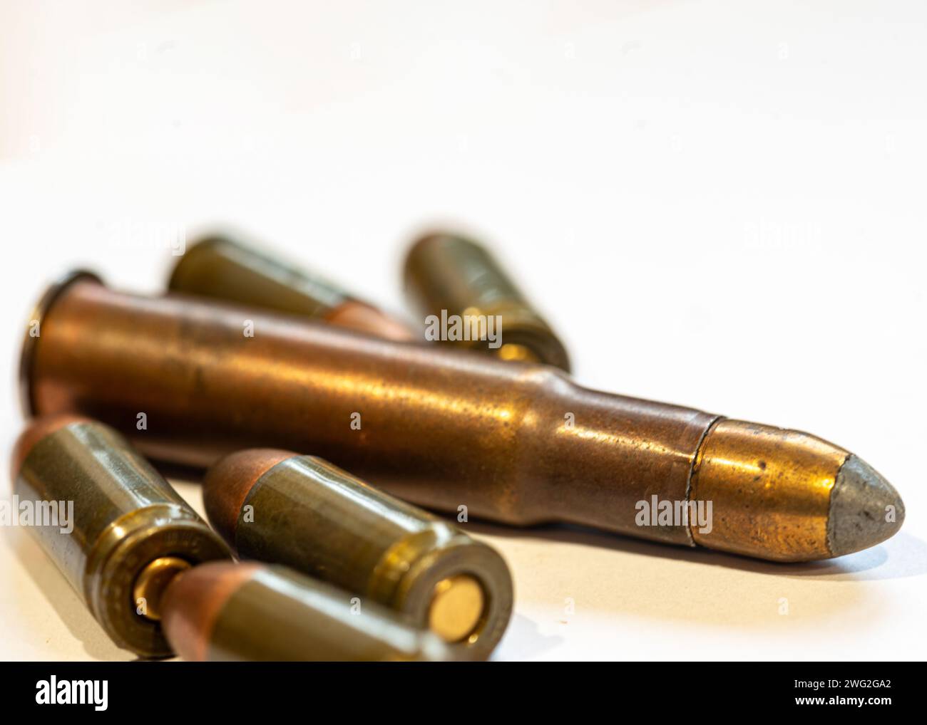 photograph of fired bullets and cartridges, white background Stock ...
