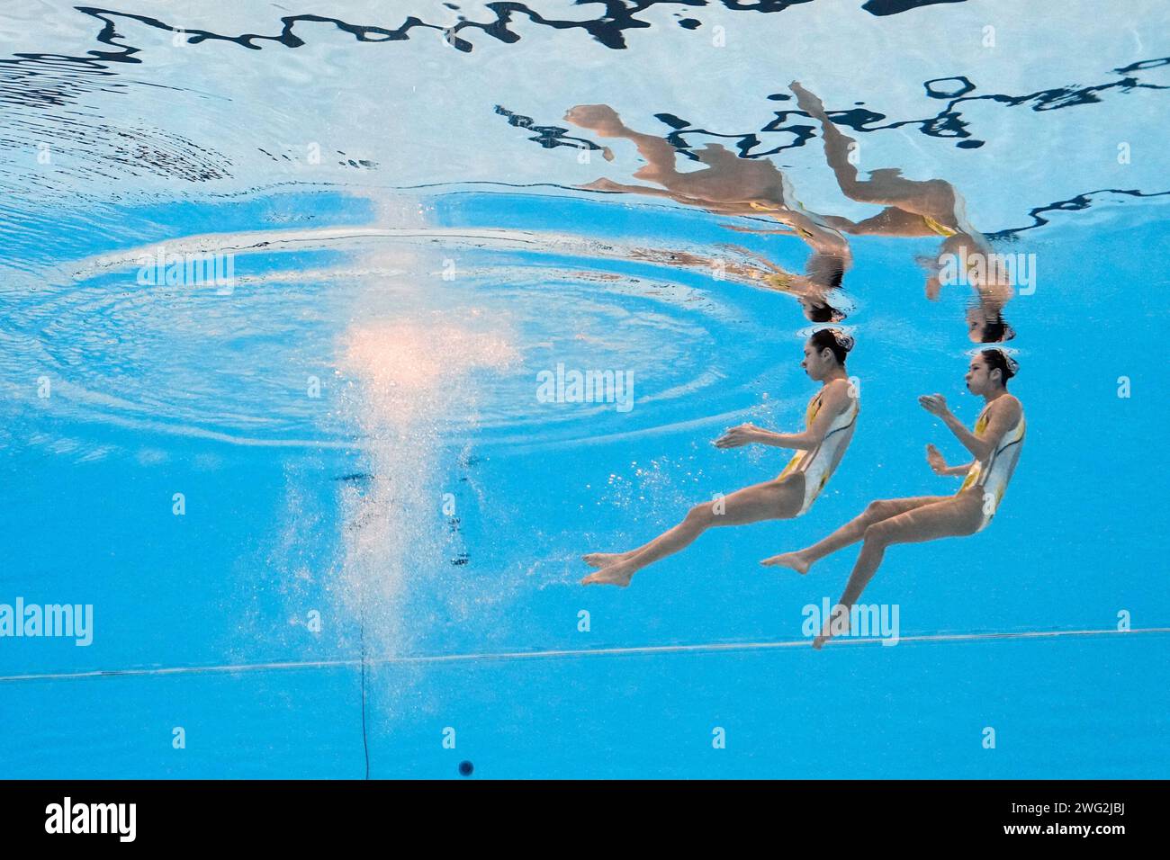 Wang Liuyi and Wang Qianyi, of China, compete in the women's duet ...