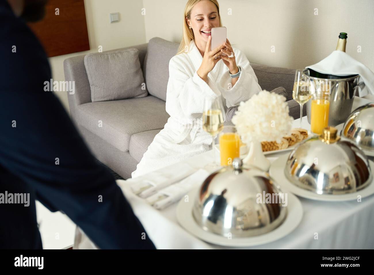 Waiter serves guest hi-res stock photography and images - Alamy