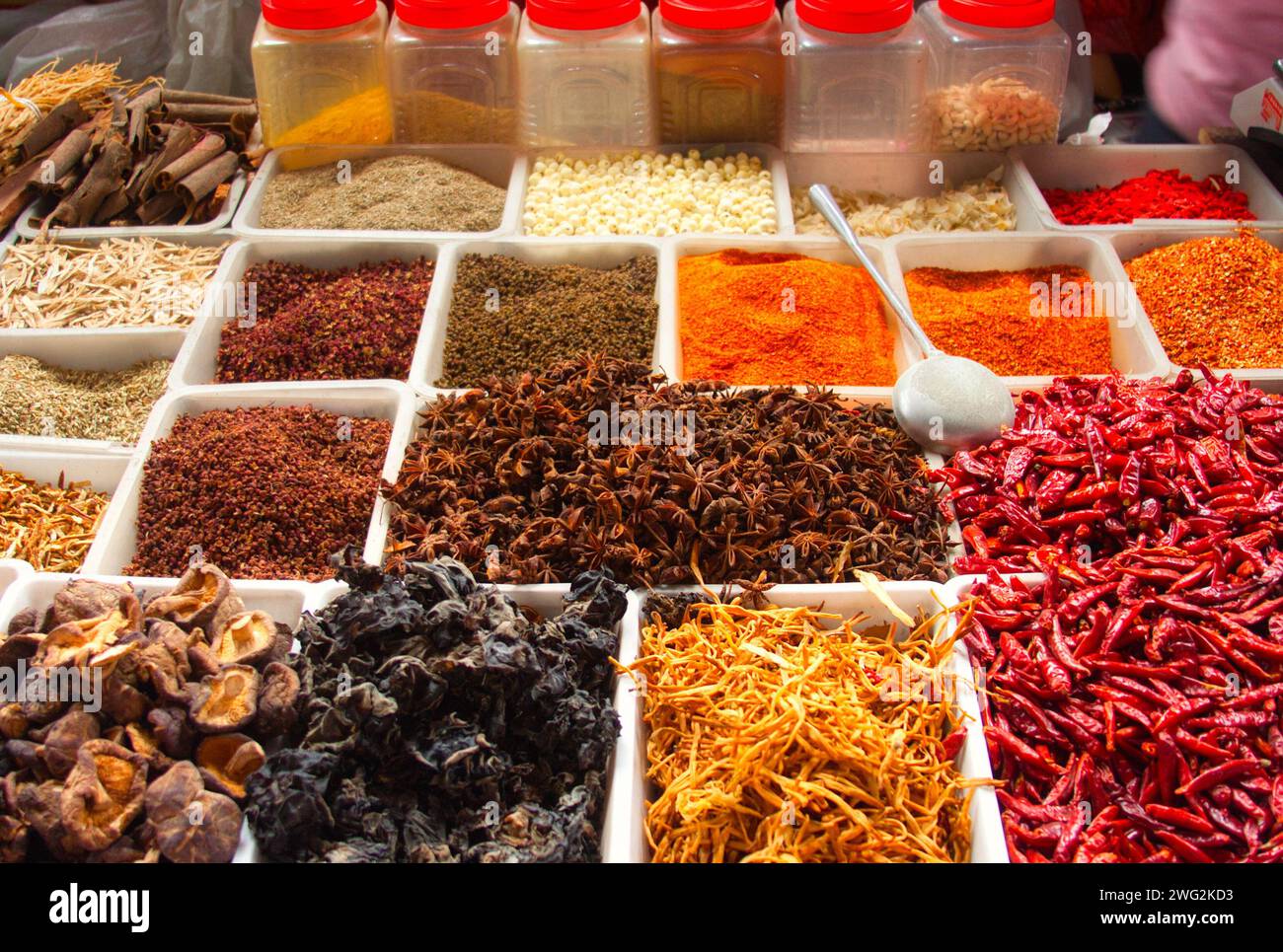 colorful dried fruits and herbs in a chinese market Stock Photo - Alamy