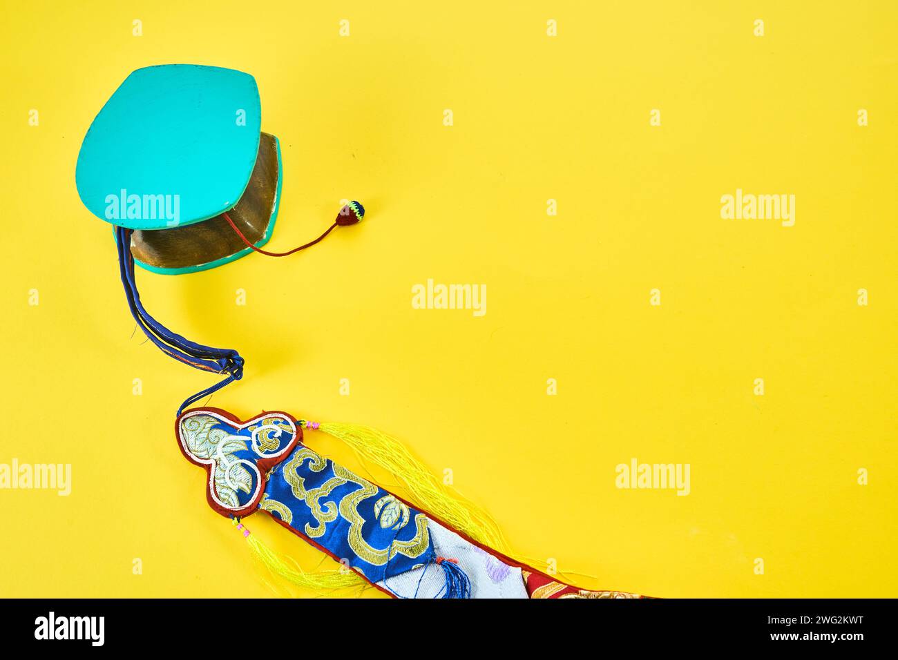 Small double membrane drum. Musical instrument of Tibet Stock Photo - Alamy