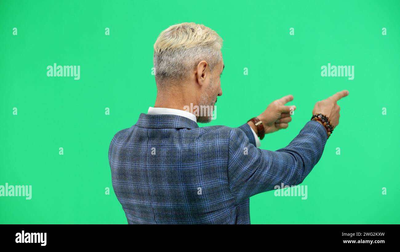 Old senior man points on hi-res stock photography and images - Alamy