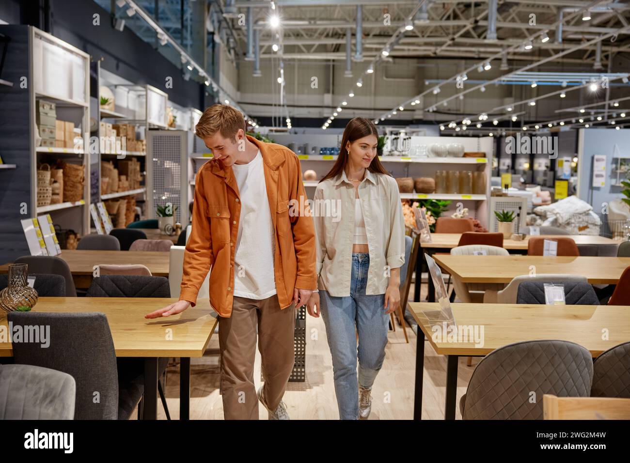 Woman testing new furniture hi-res stock photography and images - Alamy