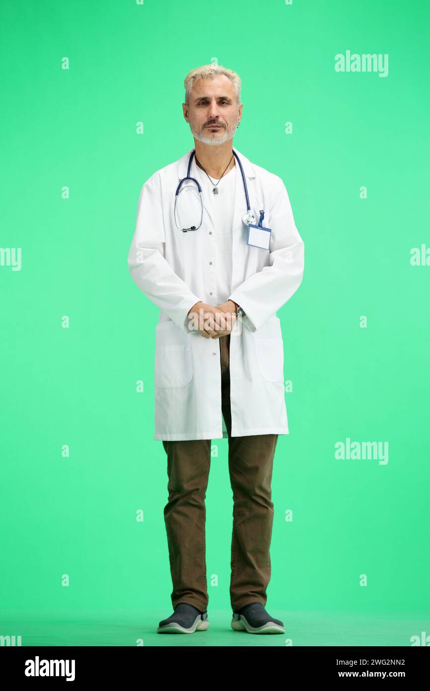 Full length mature doctor hi-res stock photography and images - Alamy