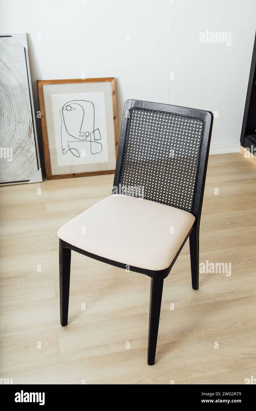 Black accent chair with the modern abstract art background Stock Photo ...