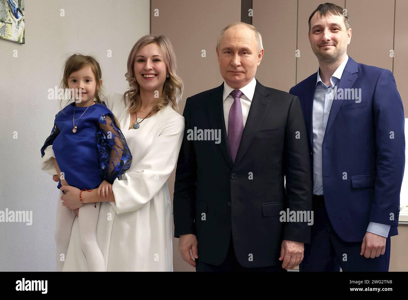 Russian President Vladimir Putin, second right, poses for a photo with ...