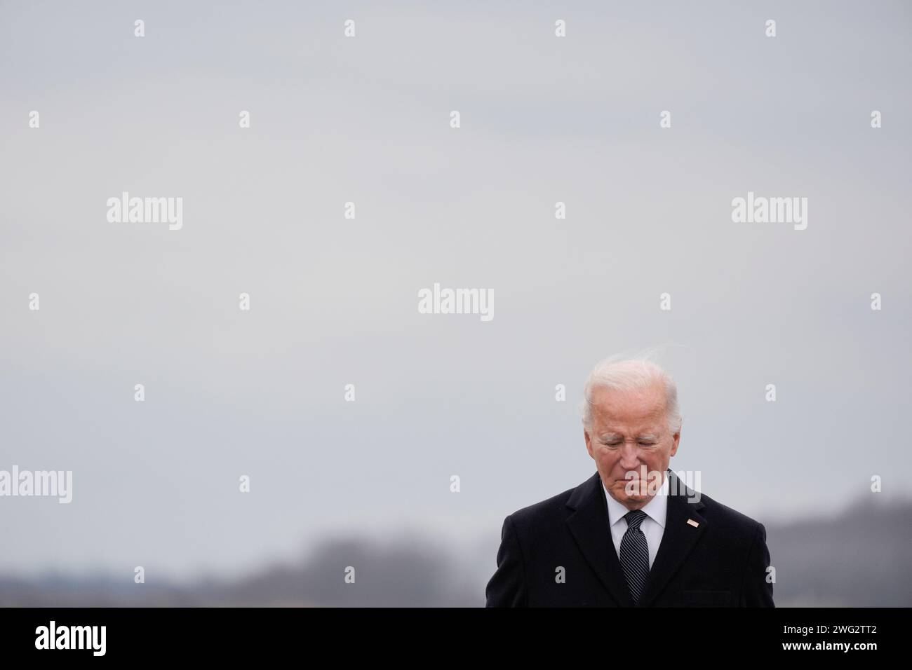 President Joe Biden bows his head during a casualty return for Sgt ...