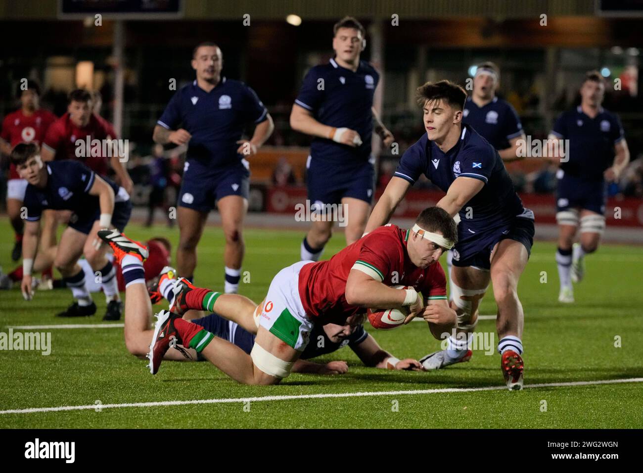 Morgan Morse of Wales U20's breaks through the Scotland U20's defence ...