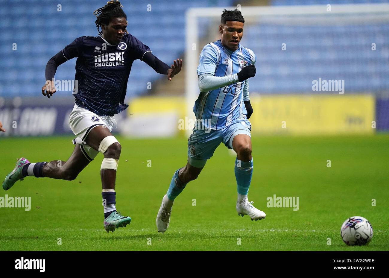Millwall's Kavalli Heywood (left) and Coventry City's Kai Andrews ...