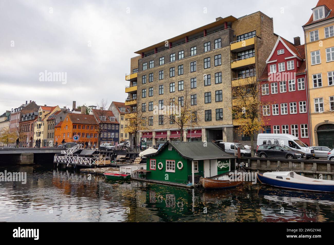 COPENHAGEN, DENMARK - OCTOBER 27, 2014: Green Carlsberg houseboat pub ...