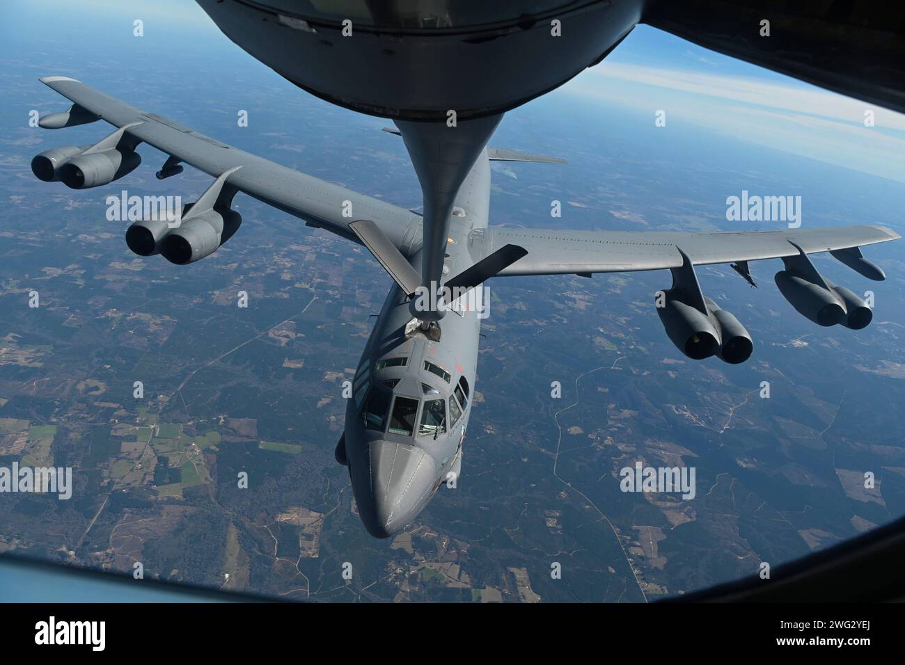 A KC-135 performs aerial refueling with a B-52 over the Southern United ...