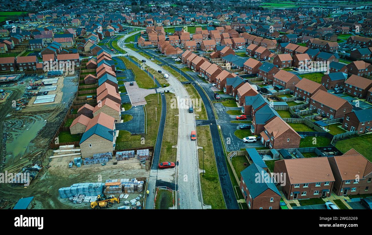 Aerial view of a suburban housing development with ongoing construction ...