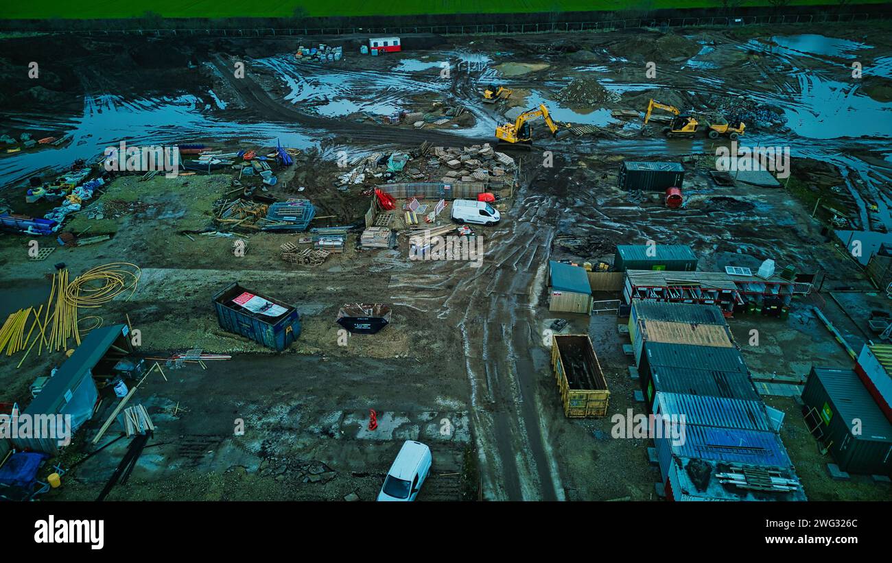 Aerial view of a busy construction site with machinery and materials ...