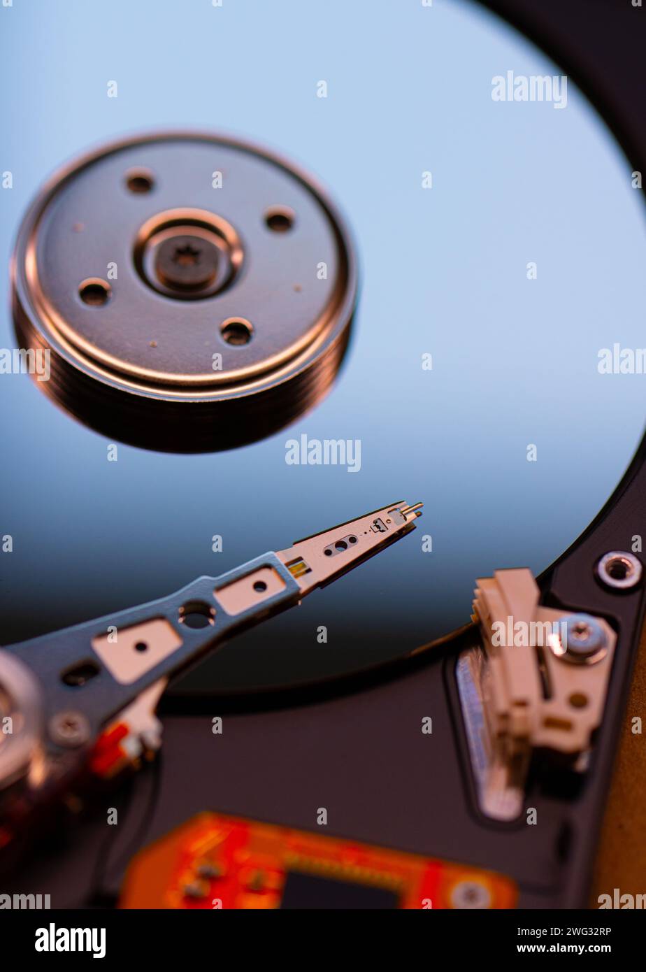 Mechanics inside a hard disk drive with platter and read write head ...