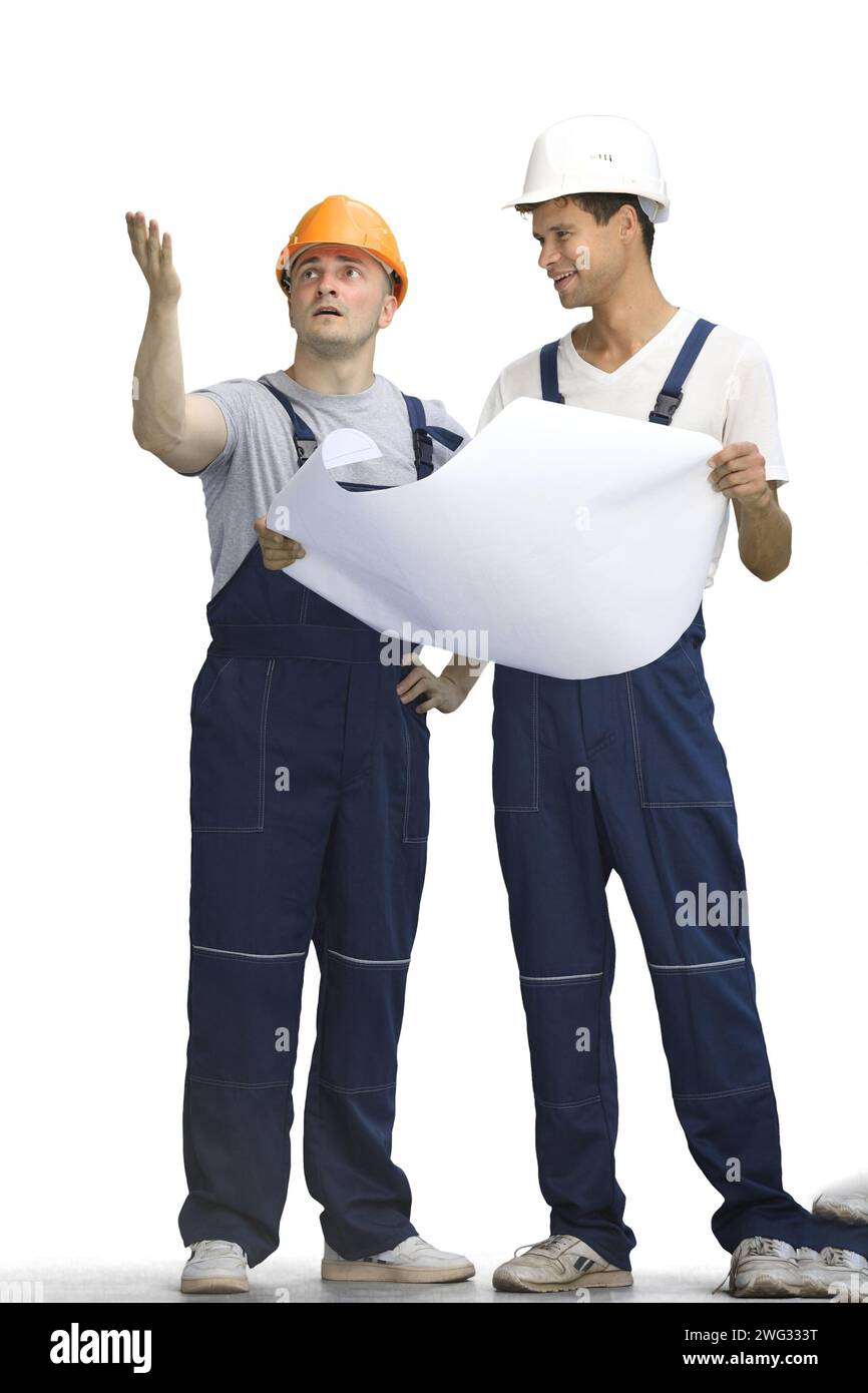Two builders, on a white background, in full height Stock Photo - Alamy