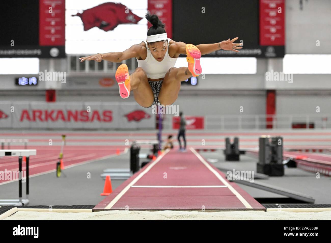 Olympic long jumper Tara Davis-Woodhall makes a practice jump at the ...