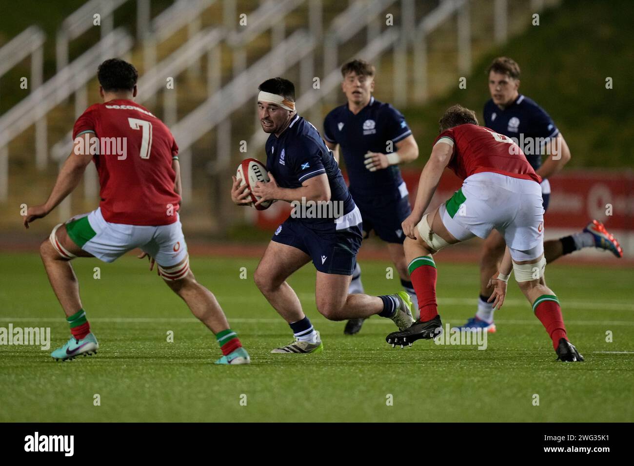 Jerry Blyth-Lafferty of Scotland U20's runs at Lucas de la Rua of Wales ...