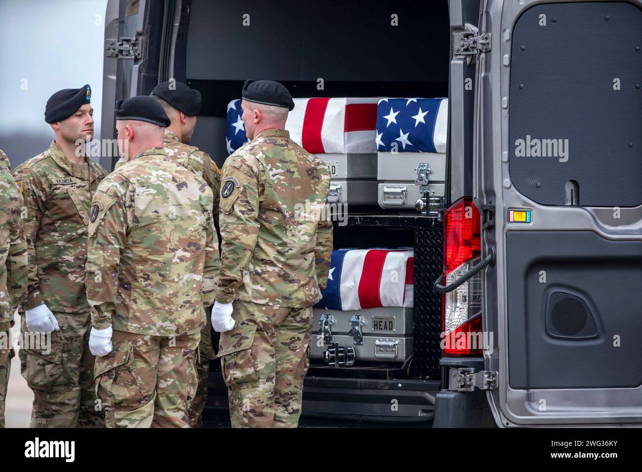 A U.S. Army carry team looks on as the remains of Army Sgt. Kennedy ...