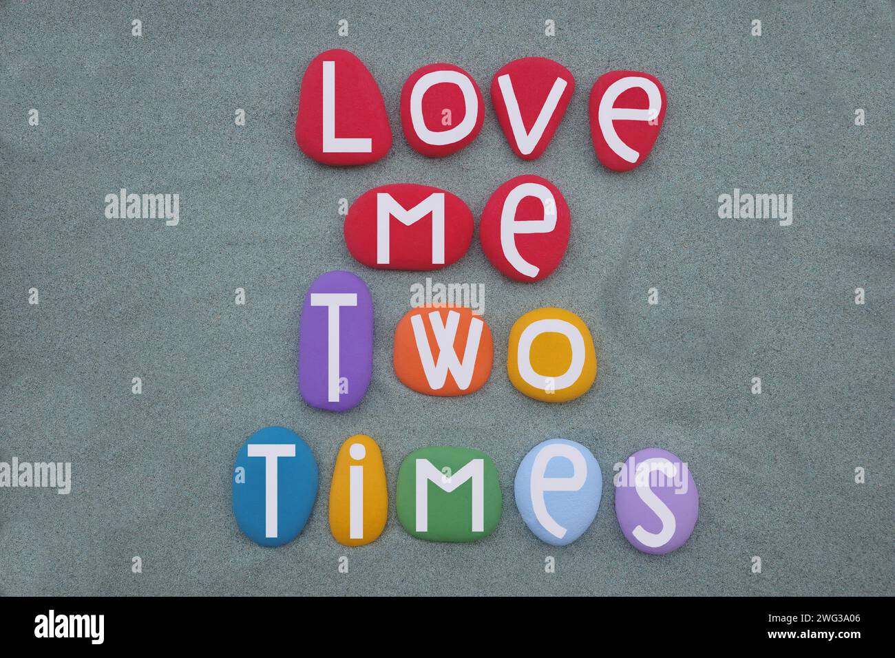 Love me two times, creative message composed with hand painted multi ...