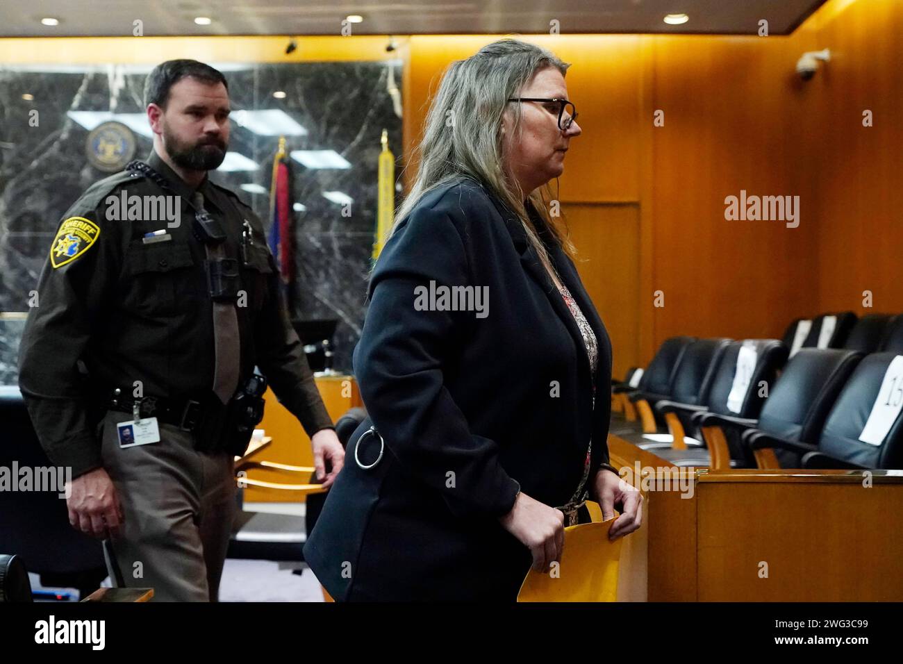 Jennifer Crumbley is escorted out of the Oakland County courtroom ...