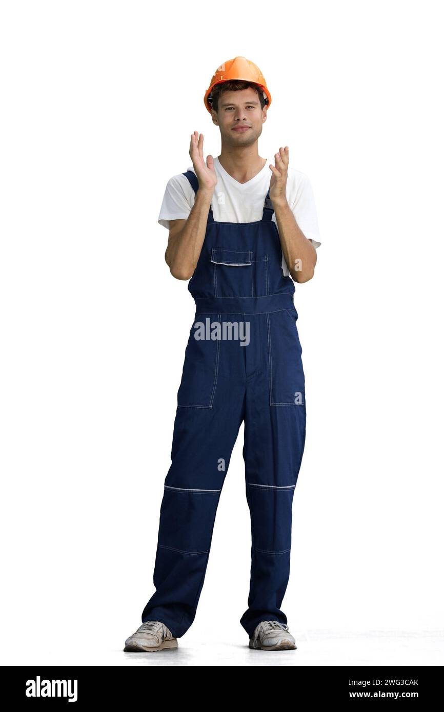 A male construction worker, on a white background, in full height ...