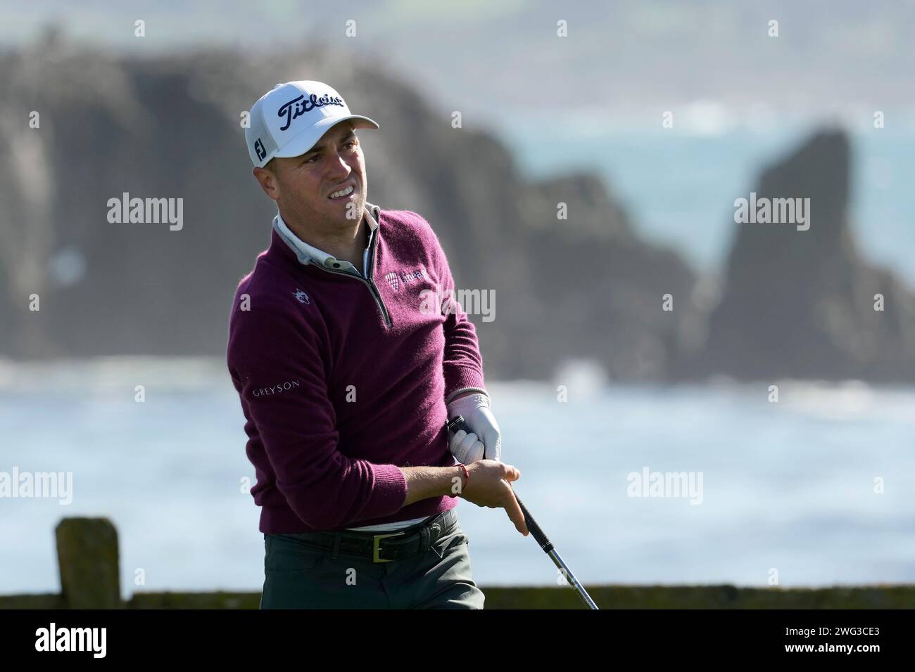 Justin Thomas watches his shot from the 18th tee at Pebble Beach Golf ...