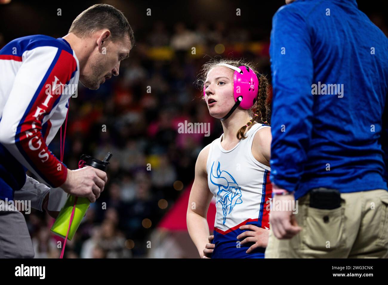 Decorah's Chloe Sheffield talks with coaches during a 100 lbs ...
