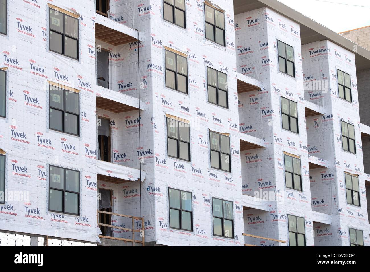 Energy efficient apartment building under construction, Downtown ...