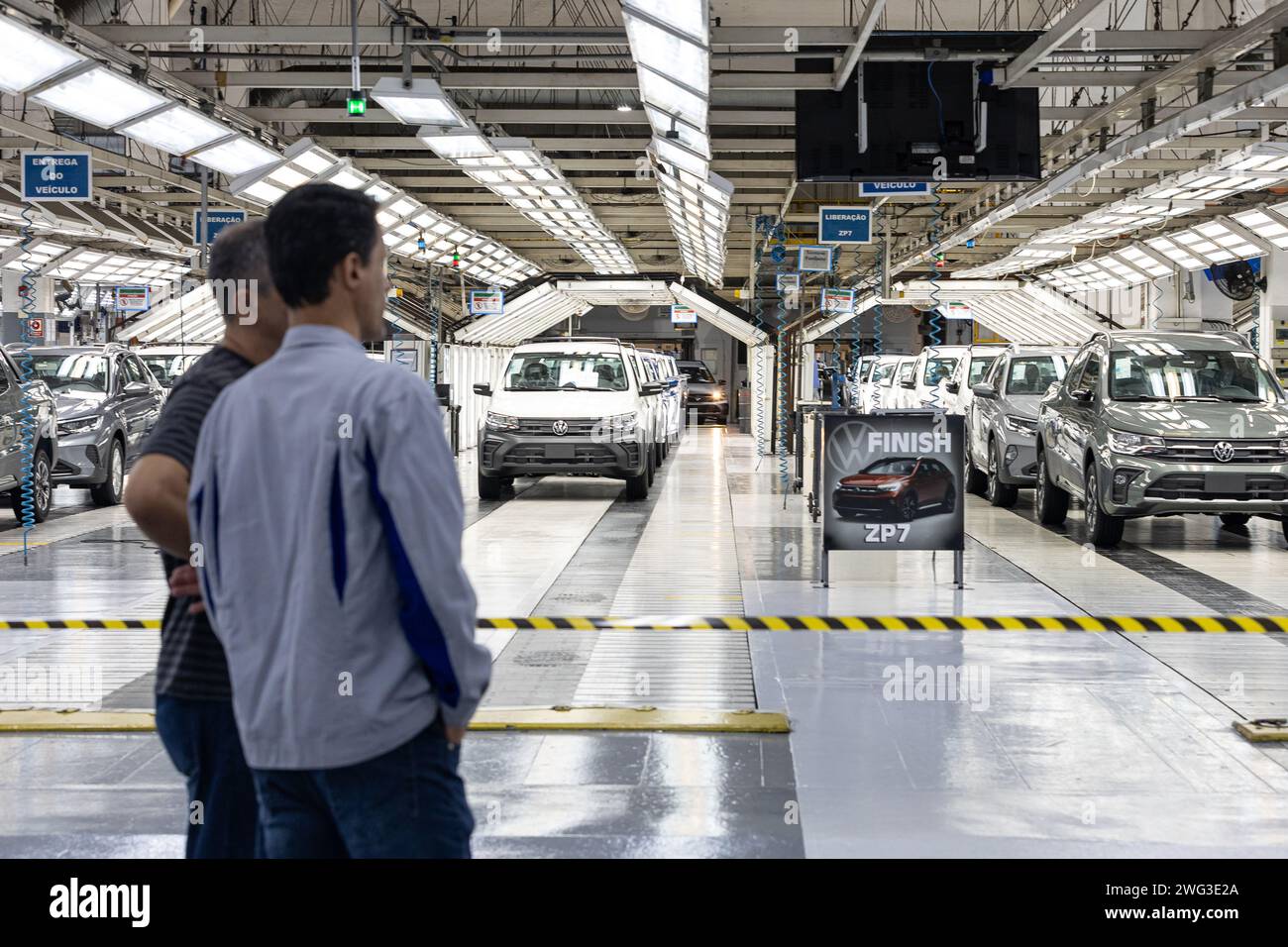 Sao Paulo, Brazil. 02nd Feb, 2024. Vehicle assemblers watch at the ...