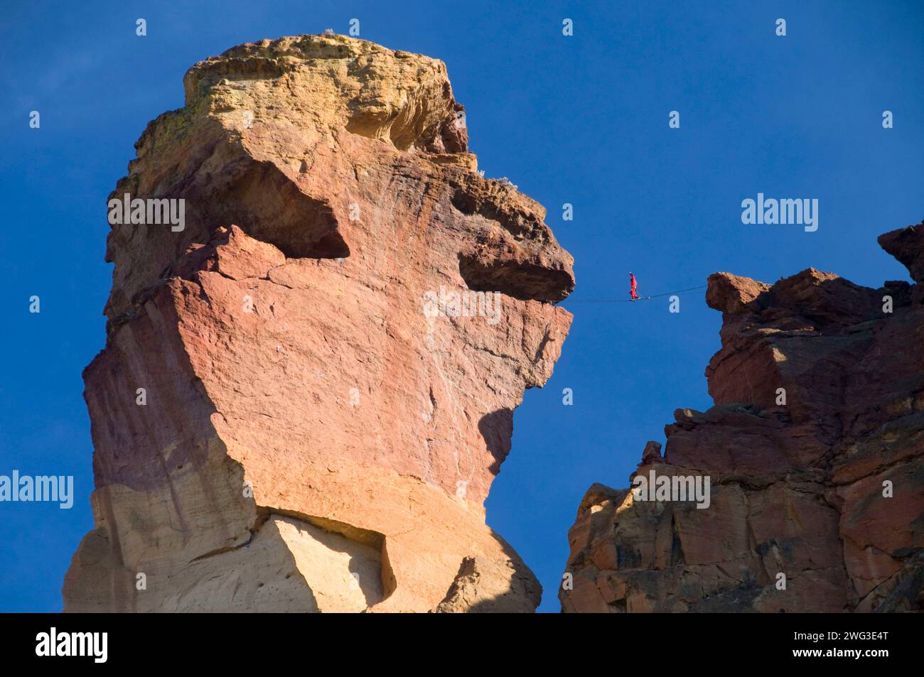 Monkeyface with tightrope walker, Smith Rock State Park, Oregon Stock ...