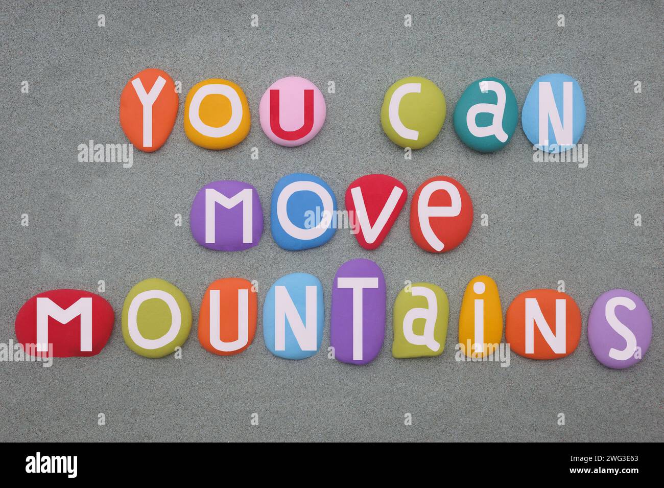 You can move mountains, motivational slogan composed with hand painted ...