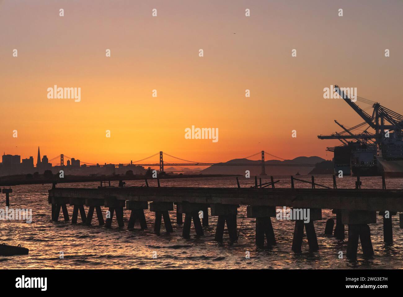 San Francisco Bay, the city and the Bay Bridge at sunset as seen from ...