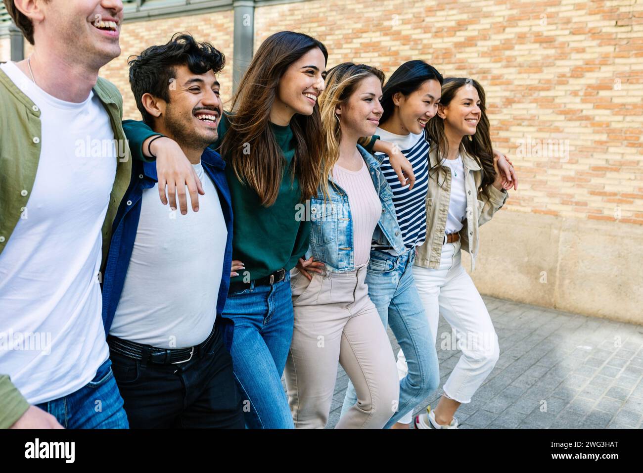 Diverse group walking together hi-res stock photography and images - Alamy