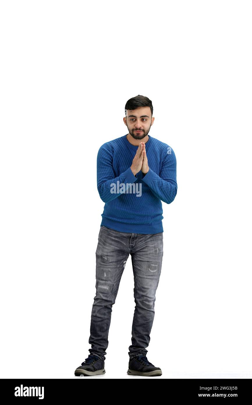 A man, full-length, on a white background, rubs his hands Stock Photo ...