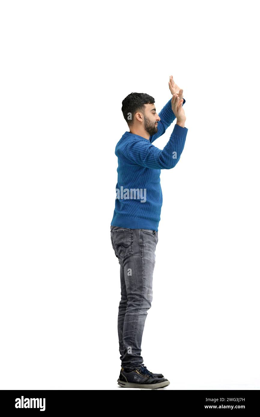 A man, full-length, on a white background, waving his arms Stock Photo ...