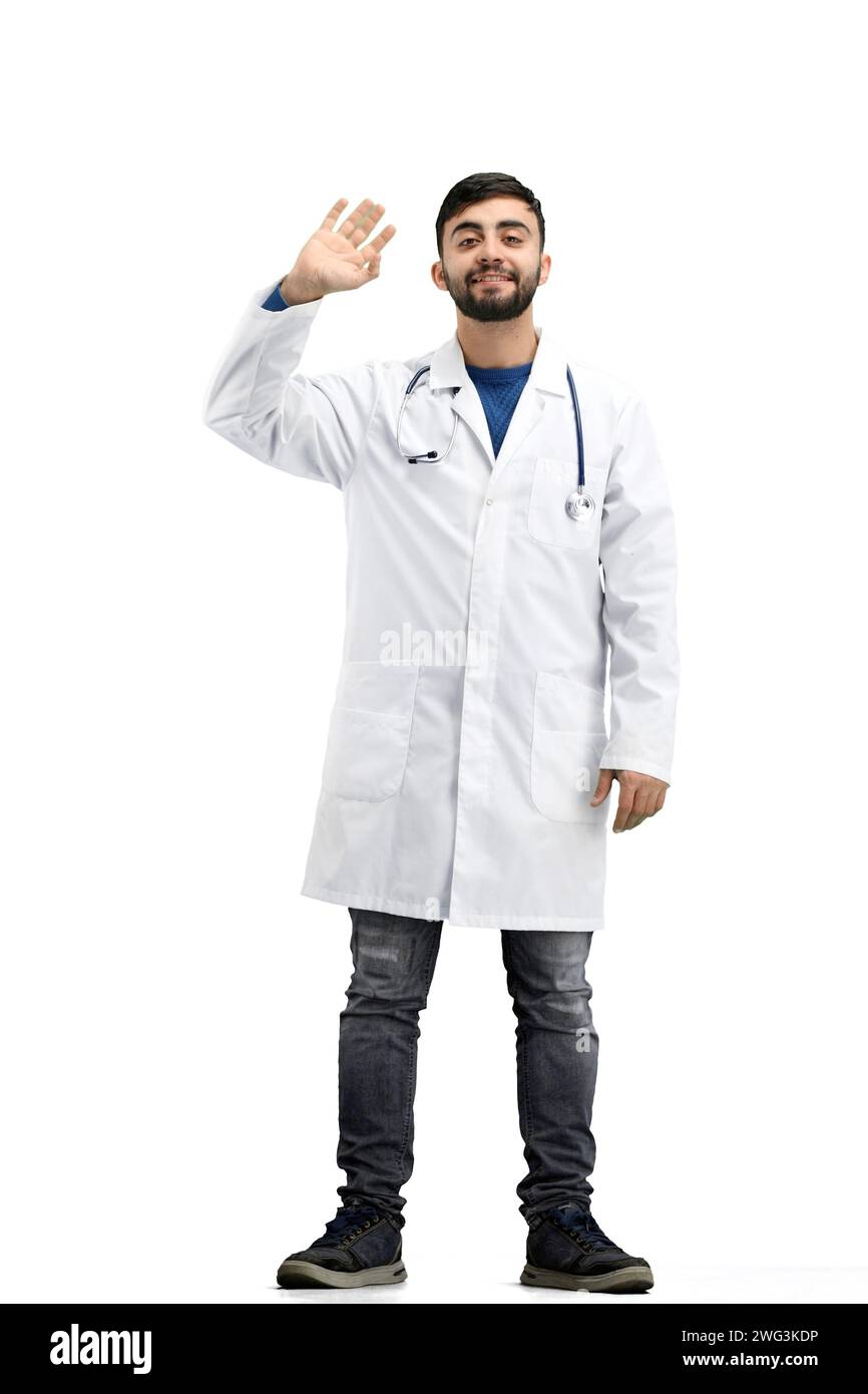 The doctor, in full height, on a white background, waving his hand ...