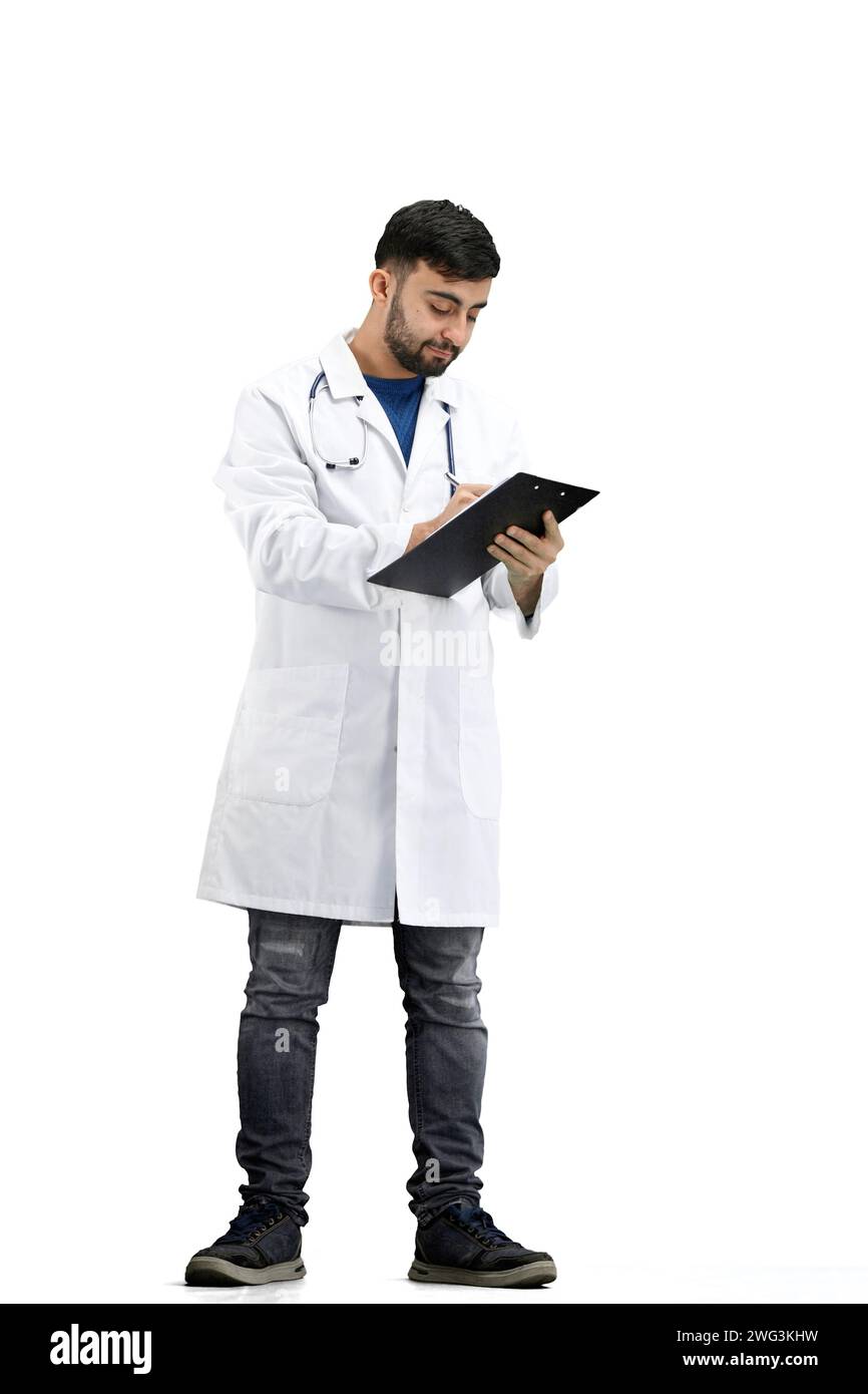 Doctor cardiologist in office writes hi-res stock photography and ...