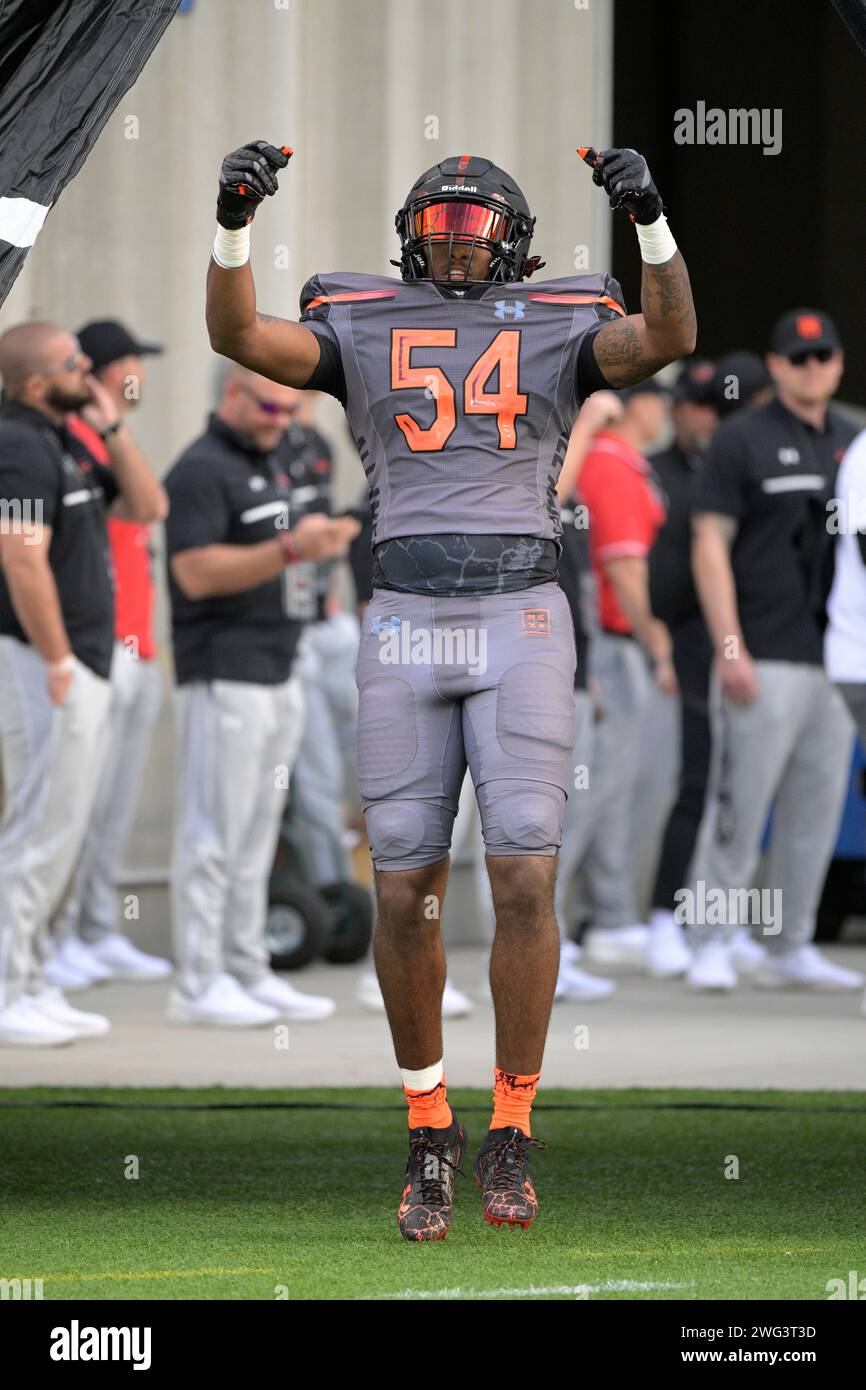 Team Fire linebacker Adarius Hayes (54) runs onto the field during ...