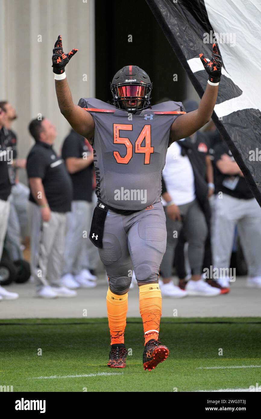 Team Fire offensive lineman Ziron Brown (54) runs onto the field during ...