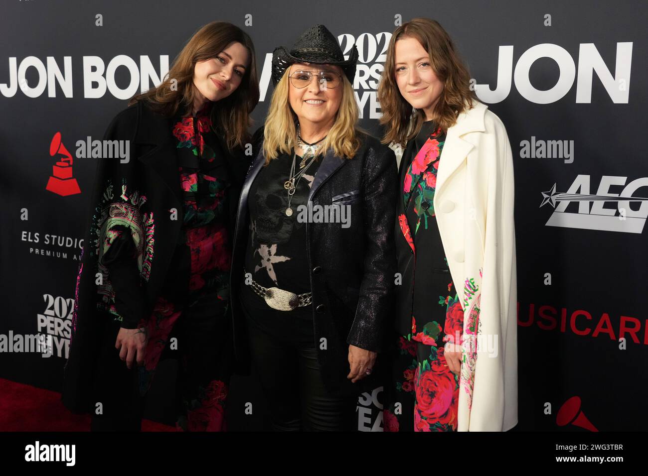 Rebecca Lovell, from left, Melissa Etheridge, and Megan Lovell arrive ...