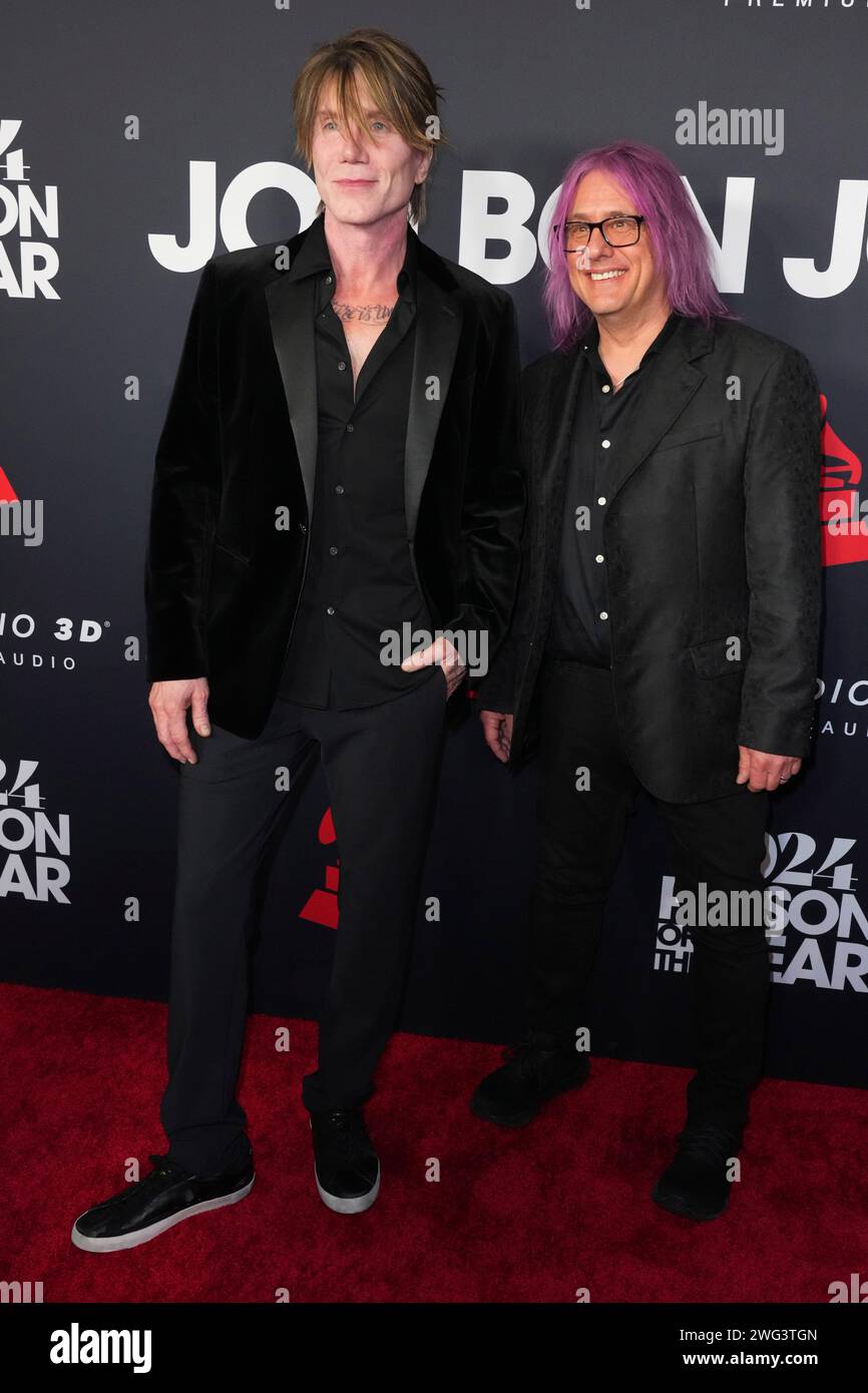 John Rzeznik, left, and Robby Takac of the Goo Goo Dolls arrive at ...