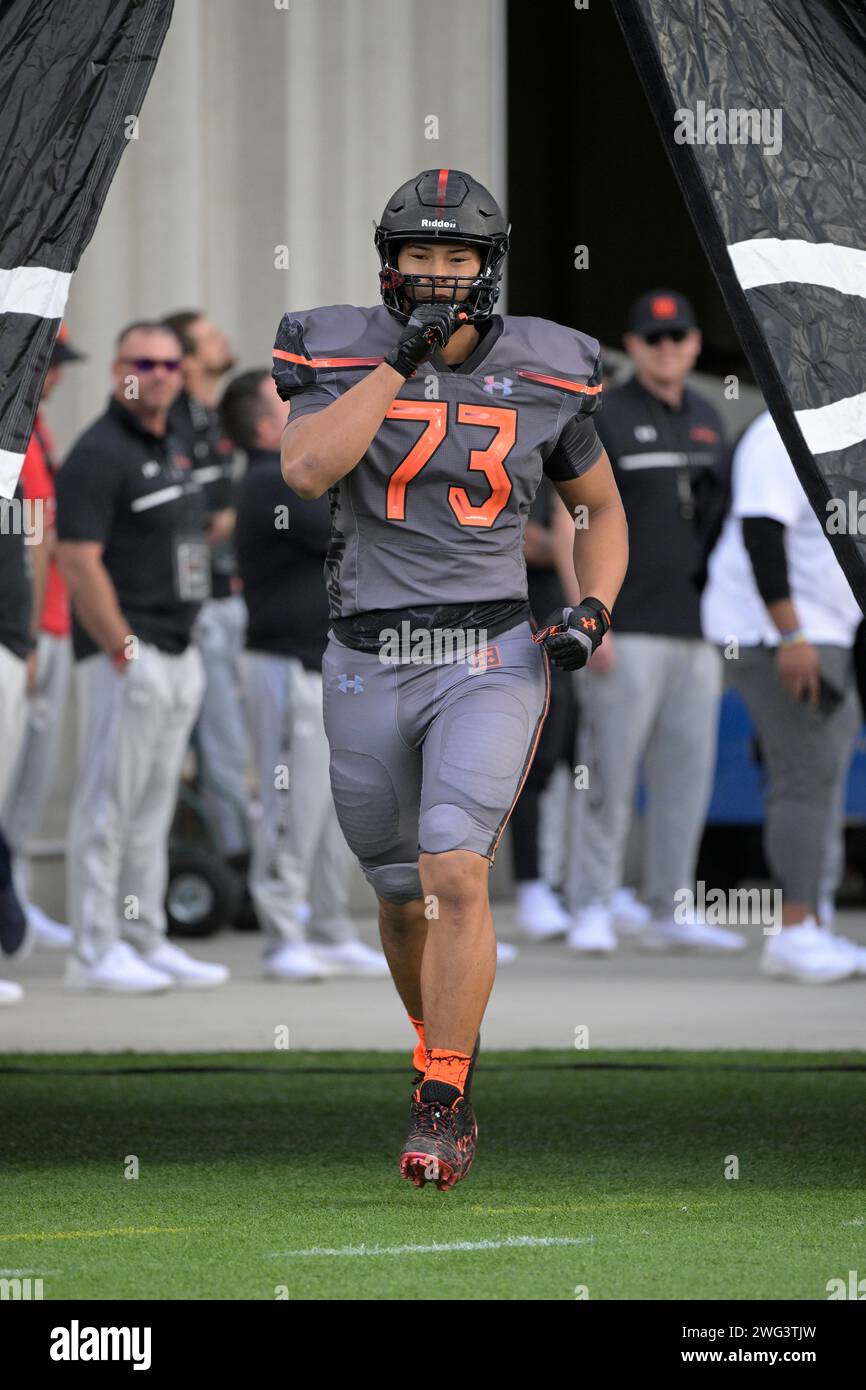 Team Fire offensive lineman Rustin Young (73) runs onto the field ...