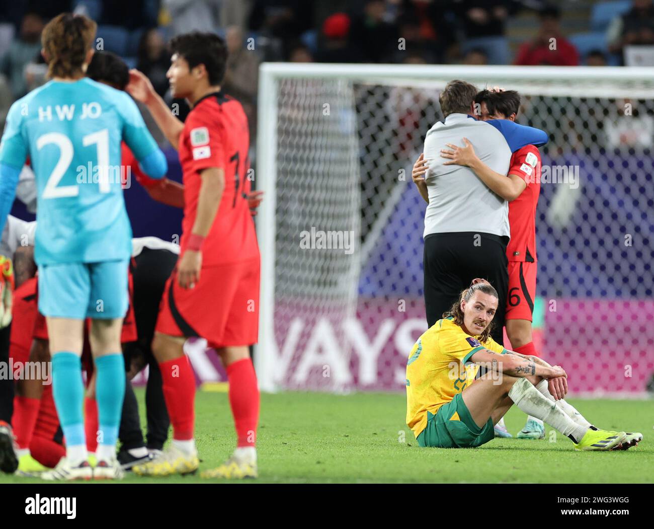 Doha, Qatar. 2nd Feb, 2024. Jackson Irvine (bottom) of Australia looks ...