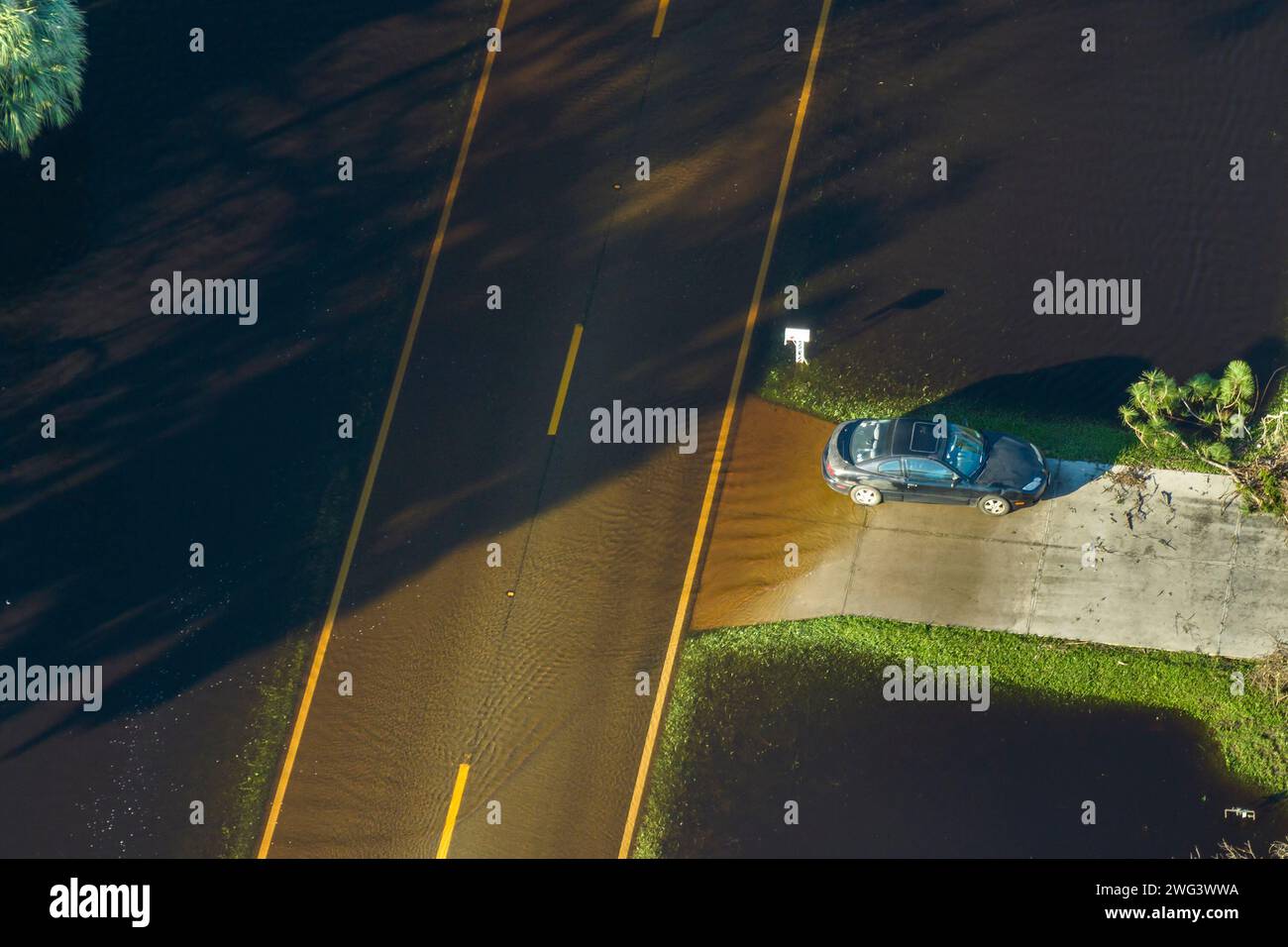 Flooded american street in Florida residential area. Hazardous driving ...