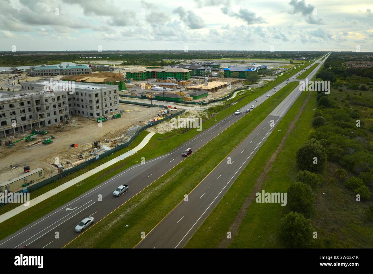 Top view of apartment buildings under construction in developing ...