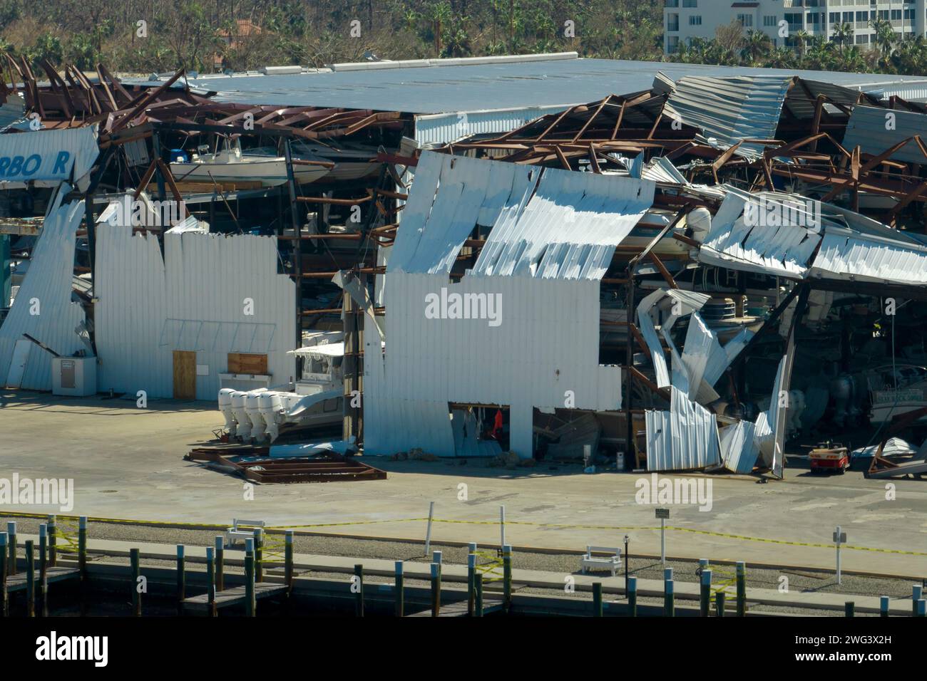 Warehouse with motorboats and yachts destroyed by hurricane winds in ...
