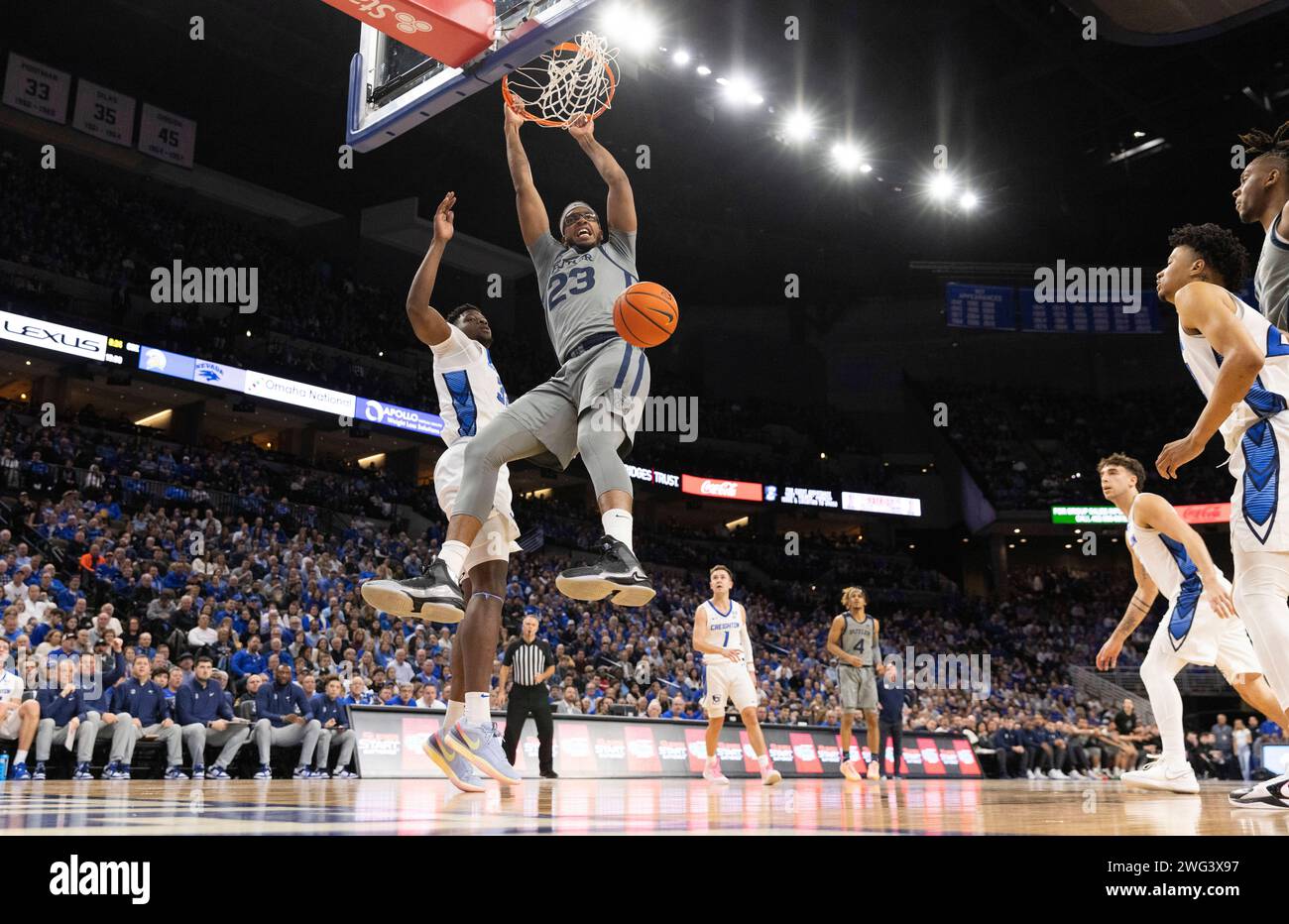 Butler's Andre Screen, right, dunks against Creighton's Fredrick King ...