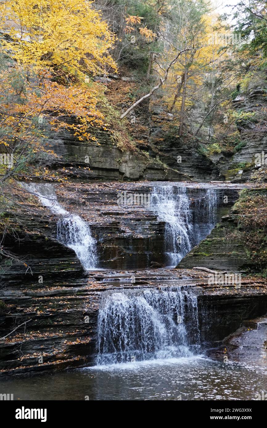 Beautiful waterfalls from above the hills with the background of fall ...