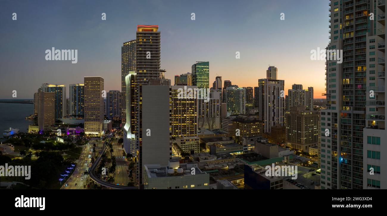 View from above of brightly illuminated skyscraper buildings in ...