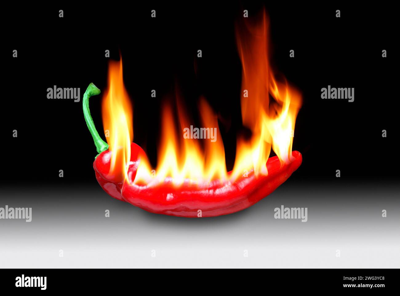 Red chilli on fire, illustration Stock Photo - Alamy